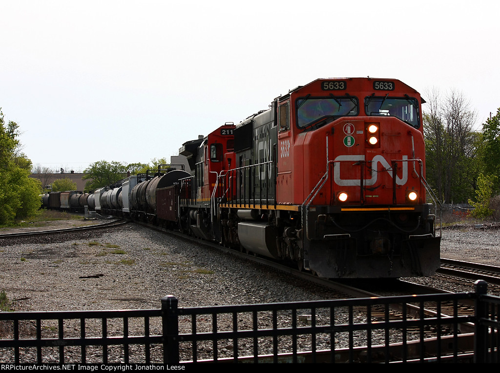CN 5633 flies east with a freight